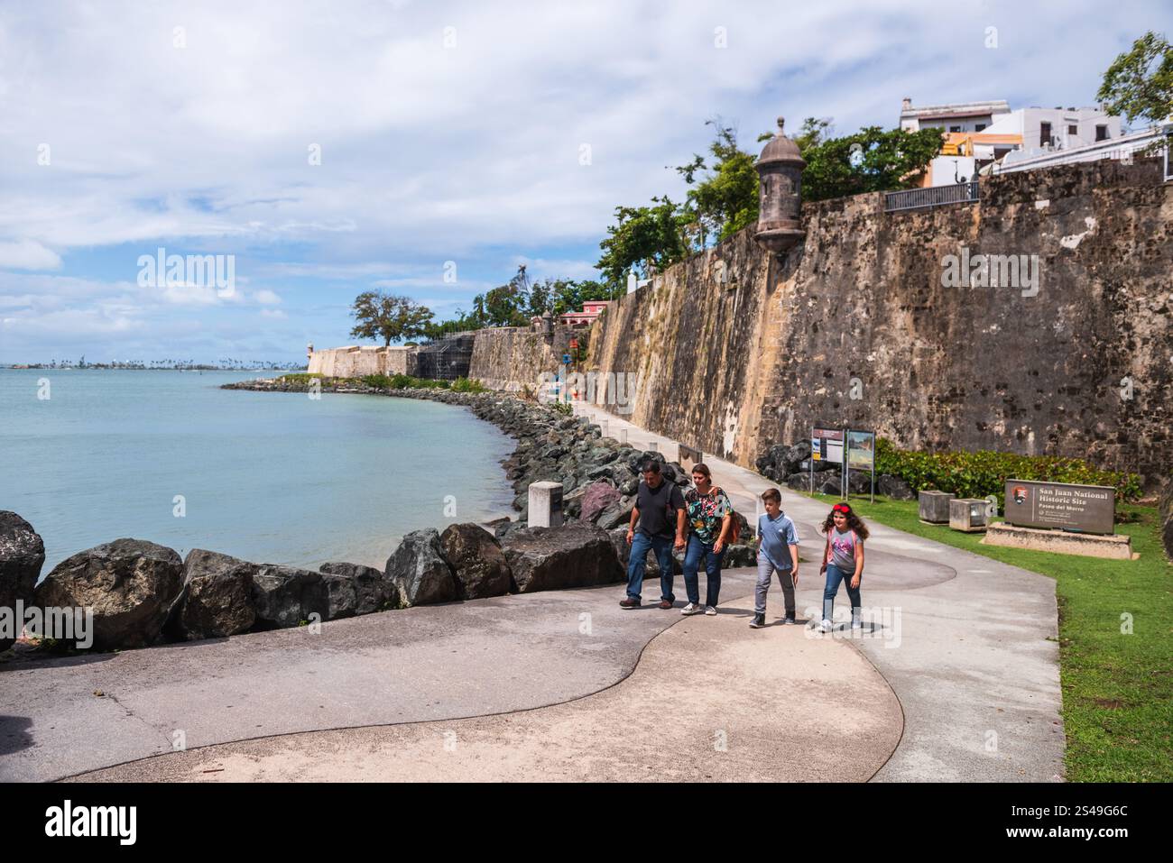 San Juan, Puerto Rico - February 25, 2018: Family walking on Paseo del ...