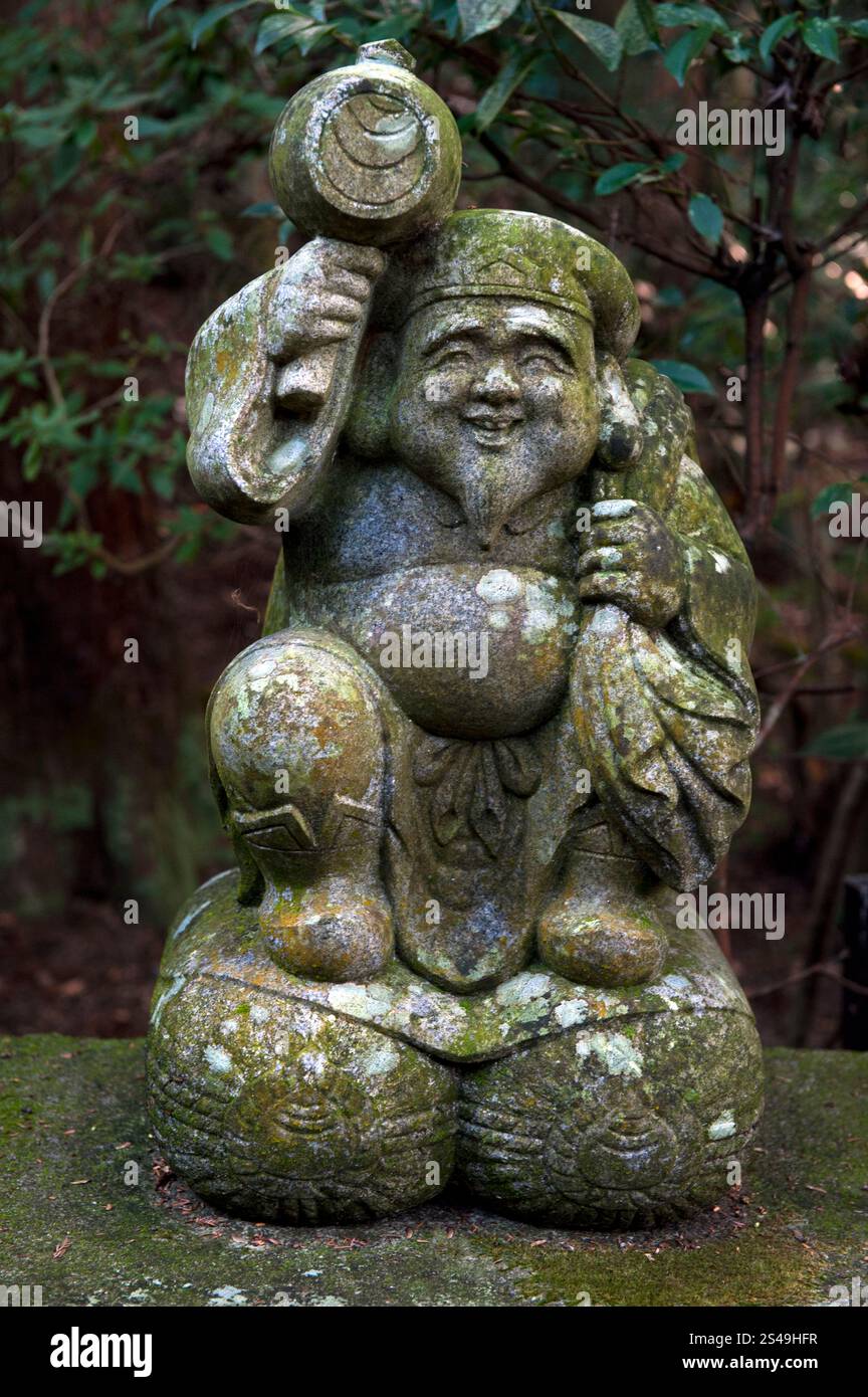 Stone statue of Daikokuten, one of the Shichifukujin (Seven Lucky Gods ...