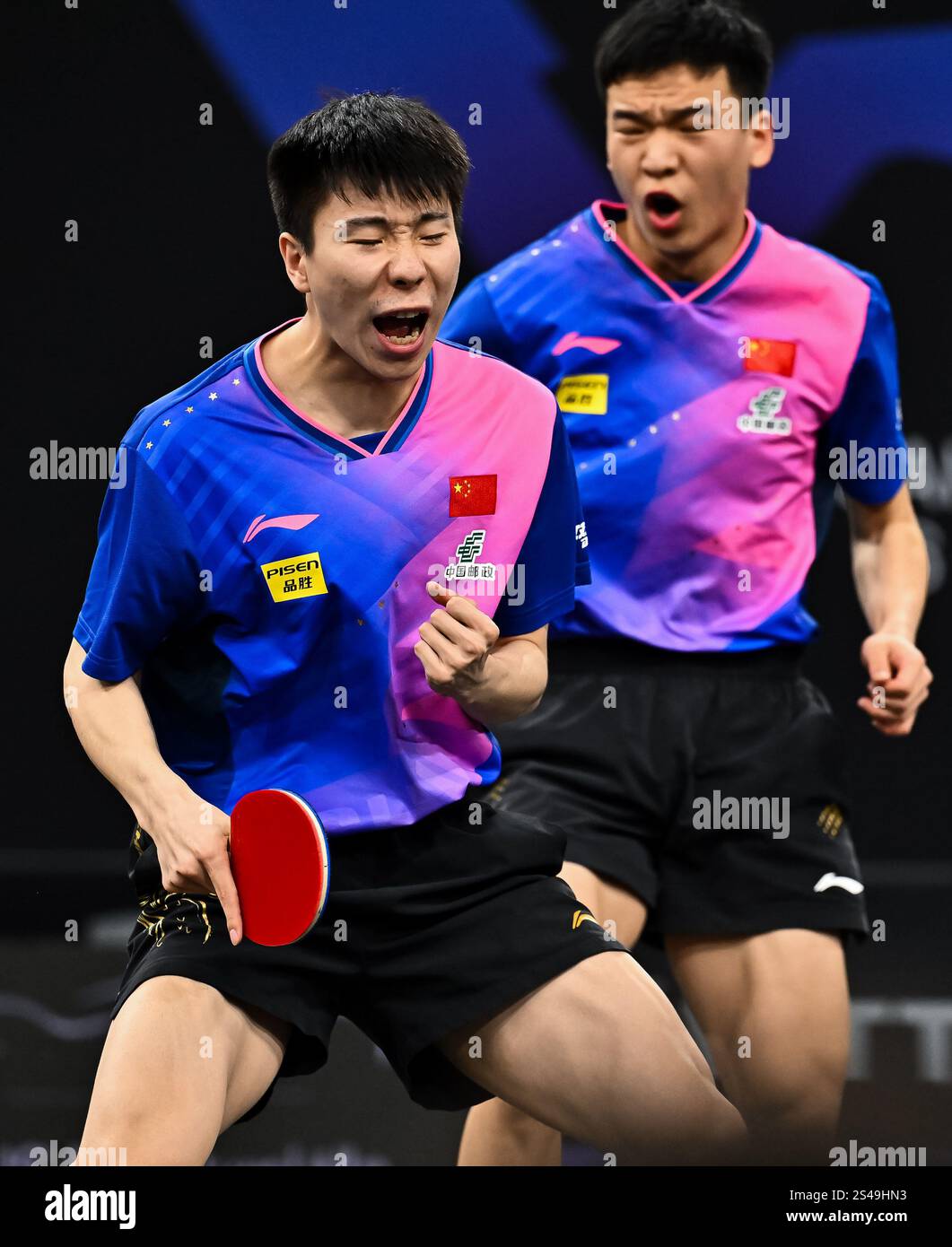 Doha, Qatar. 10th Jan, 2025. Xu Yingbin (L)/Xiang Peng celebrate during ...