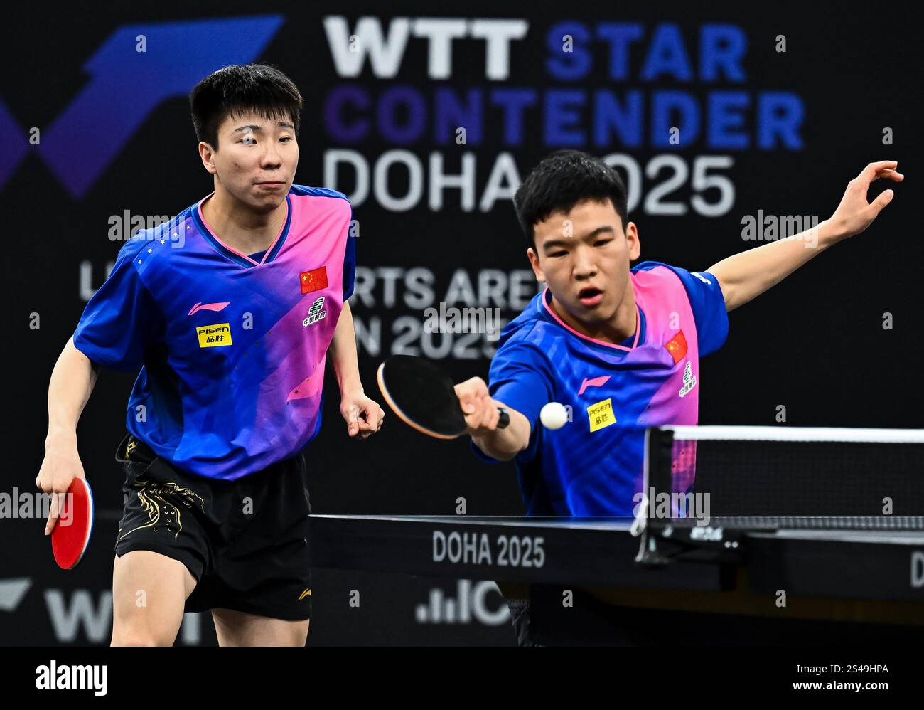 Doha, Qatar. 10th Jan, 2025. Xu Yingbin/Xiang Peng (R) compete during ...