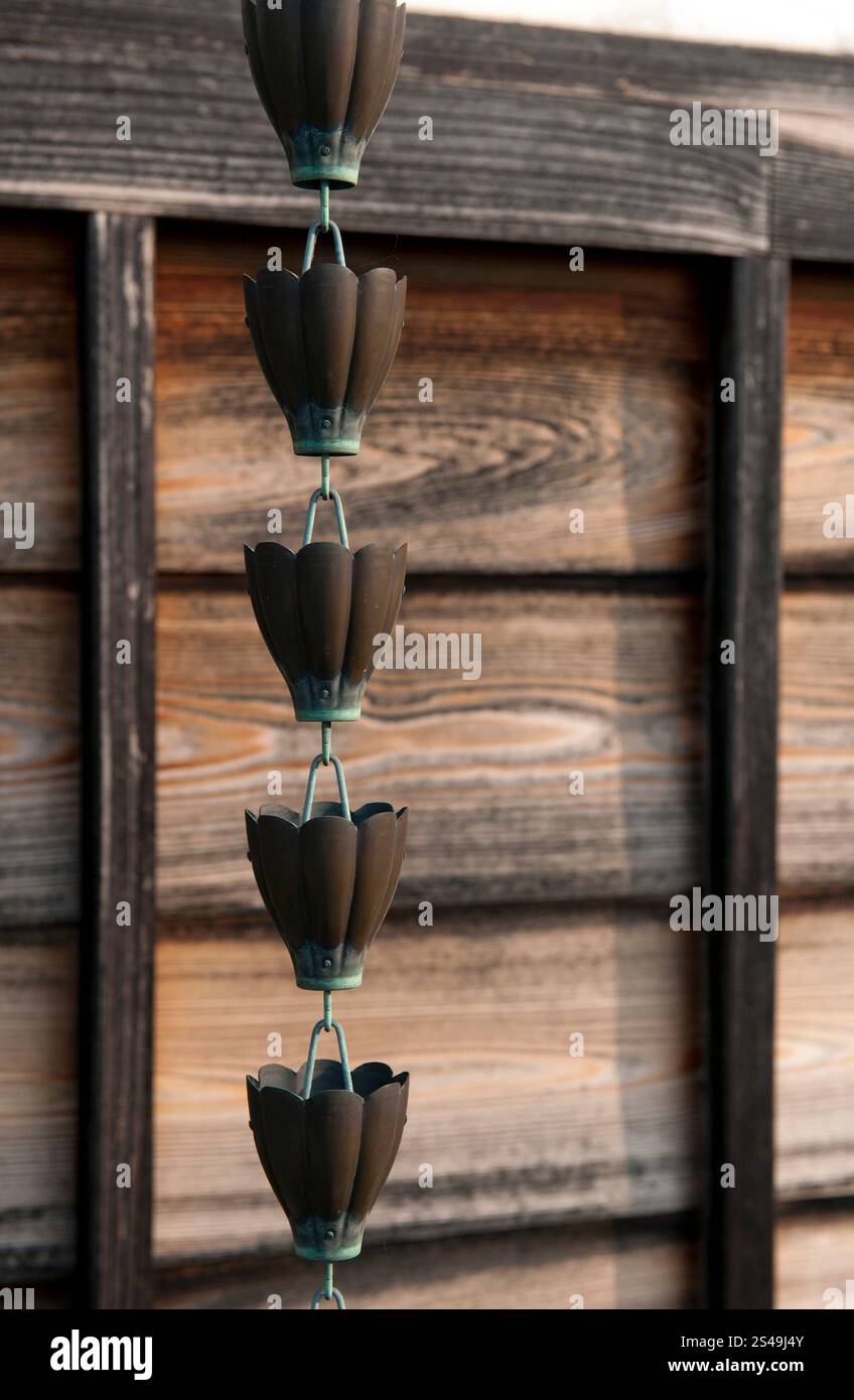 "Kusari-doi" (literally, chain gutter) is a rain chain downspout ...