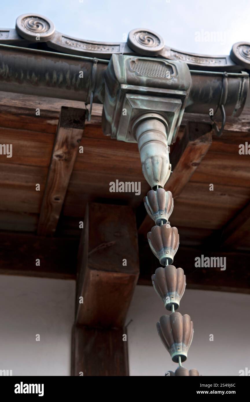 "Kusari-doi" (literally, chain gutter) is a rain chain downspout ...
