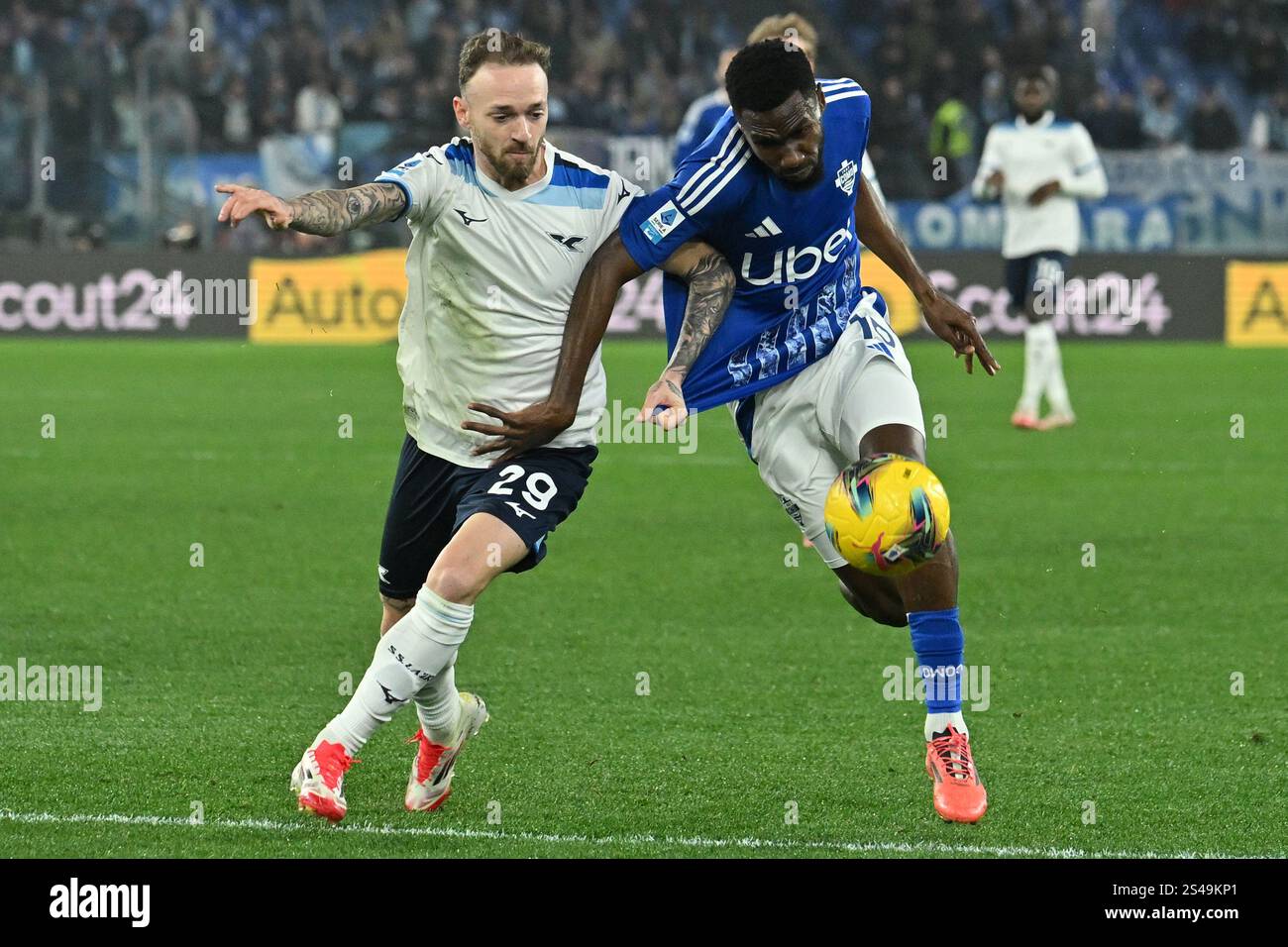 Rome, Lazio. 10th Jan, 2025. Manuel Lazzari of SS Lazio, Alieu Fadera of Como during the Serie A ...