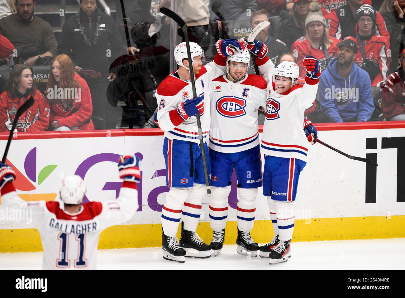 Montreal Canadiens center Nick Suzuki, second from right, celebrates ...