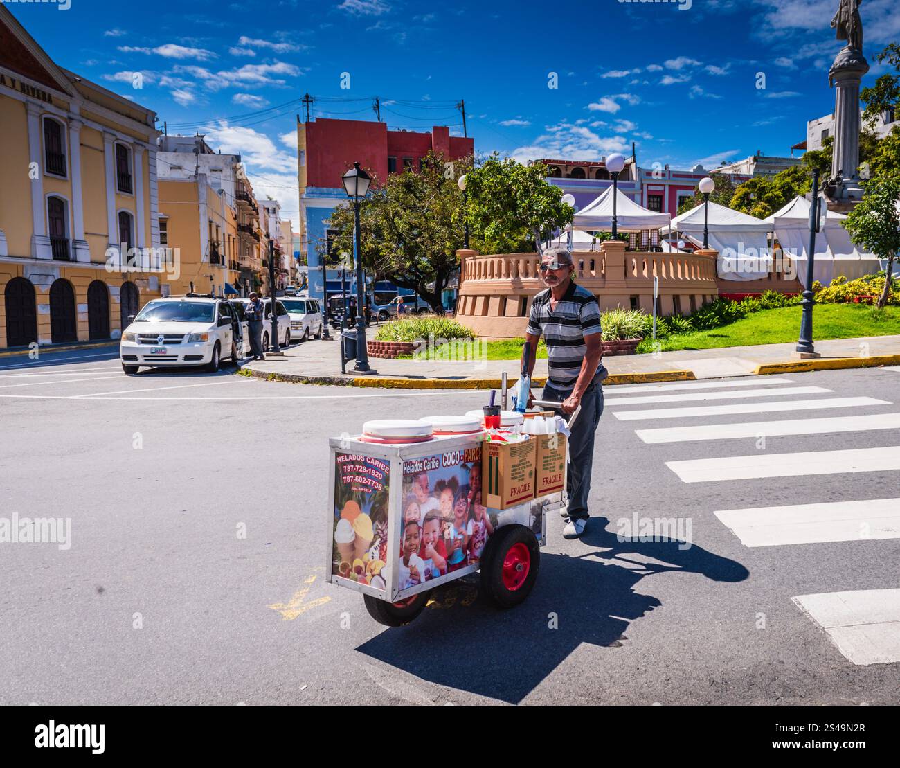 San Juan, Puerto Rico - February 26, 2018: A Puerto Rican man sells ice ...