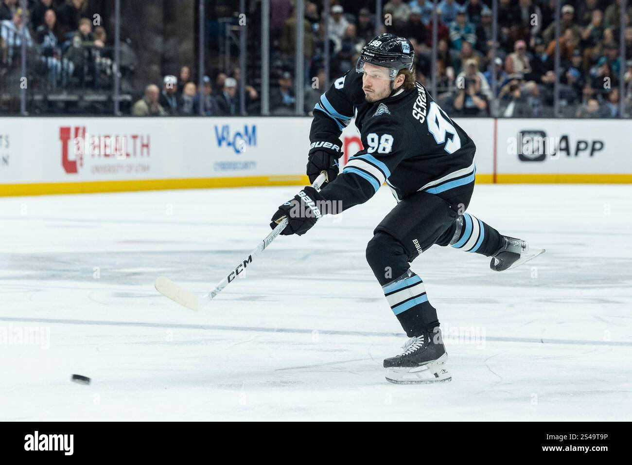 Utah Hockey Club defenseman Mikhail Sergachev (98) shoots the puck ...