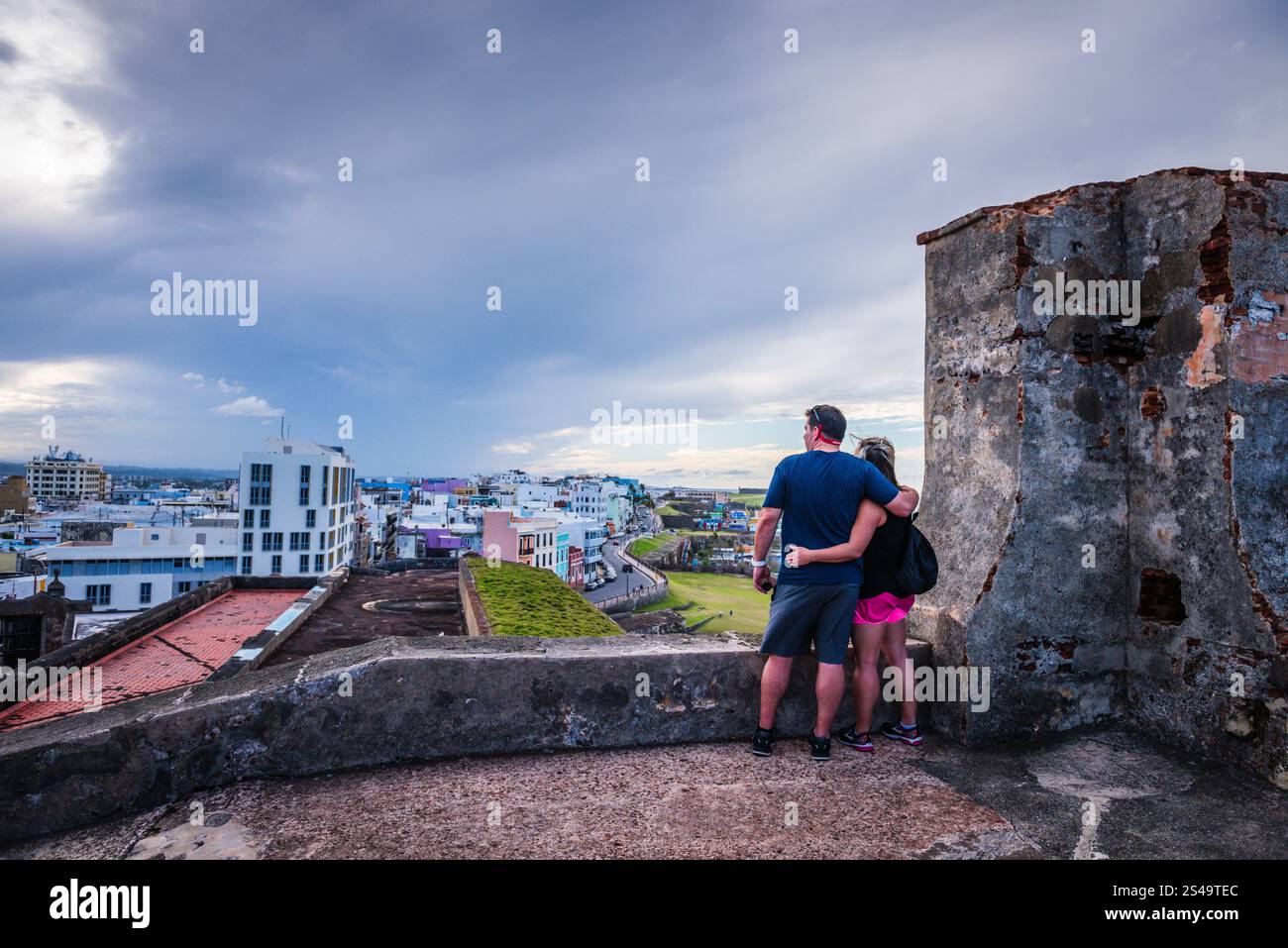 San Juan, Puerto Rico - February 26, 2018: Couple gazing at view of Old ...
