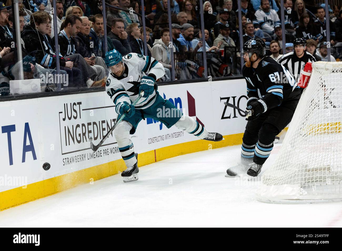 San Jose Sharks defenseman Jan Rutta (84) moves the puck against Utah ...