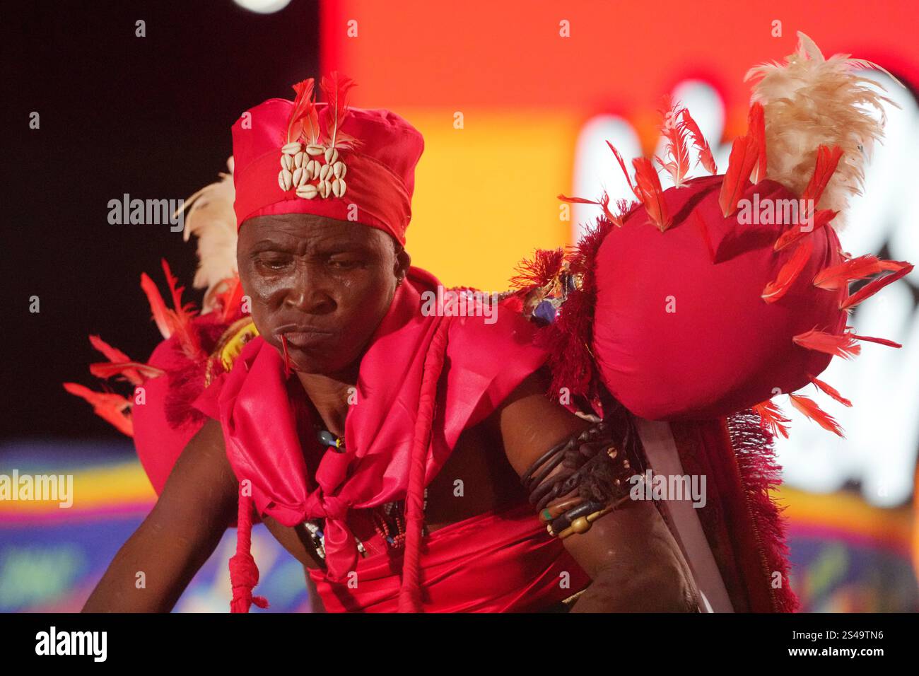 A voodoo worshippers dance during the annual Voodoo Festival in Ouidah ...