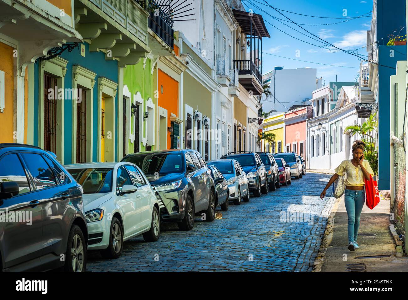 San Juan, Puerto Rico - February 27, 2018: Puerto Rican woman talks on ...