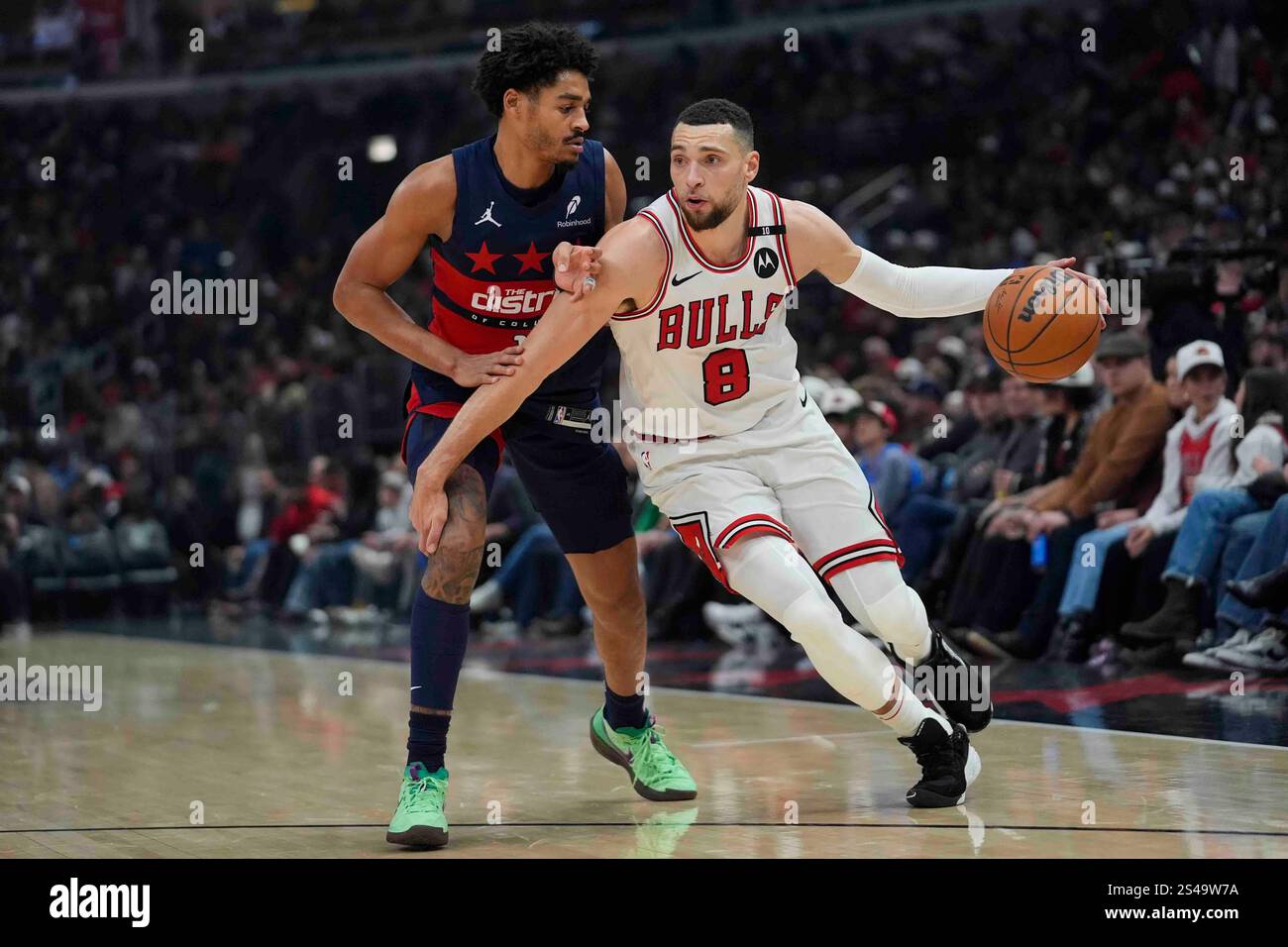 Washington Wizards guard Jordan Poole, left, guards against Chicago ...