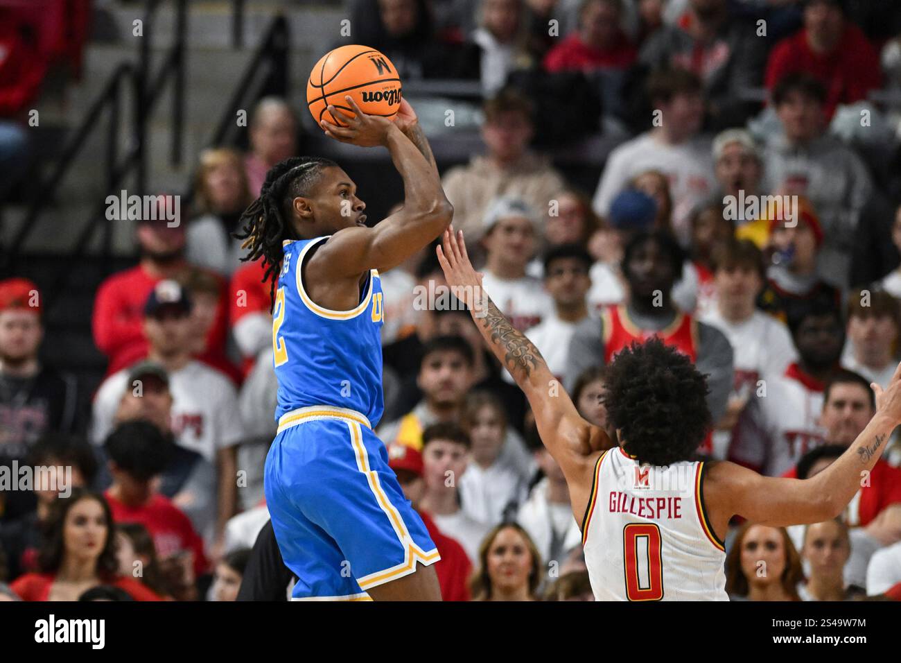 UCLA guard Dylan Andrews (2) shoots the ball against Maryland guard ...