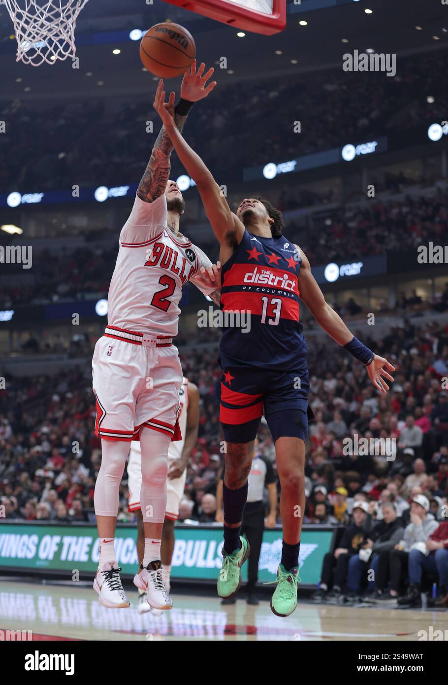 CHICAGO, IL - JANUARY 10: Lonzo Ball #2 of the Chicago Bulls blocks Jordan Poole #13 of the ...