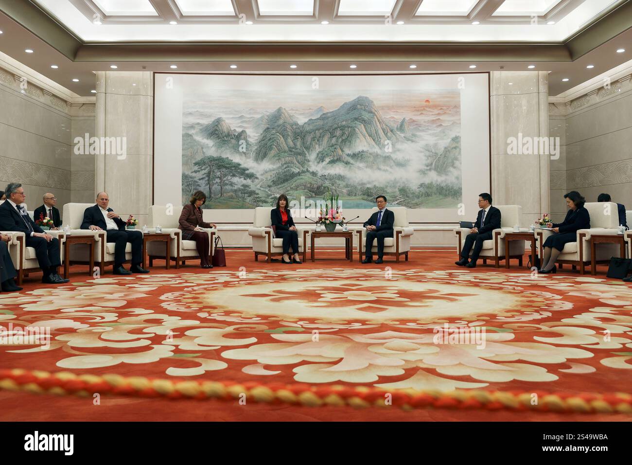 Britain's Chancellor of the Exchequer Rachel Reeves, center left, and ...