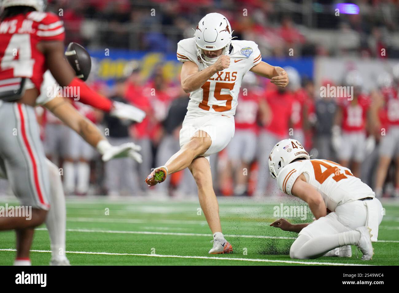 Texas place kicker Will Stone (15) kicks an extra point against Ohio ...