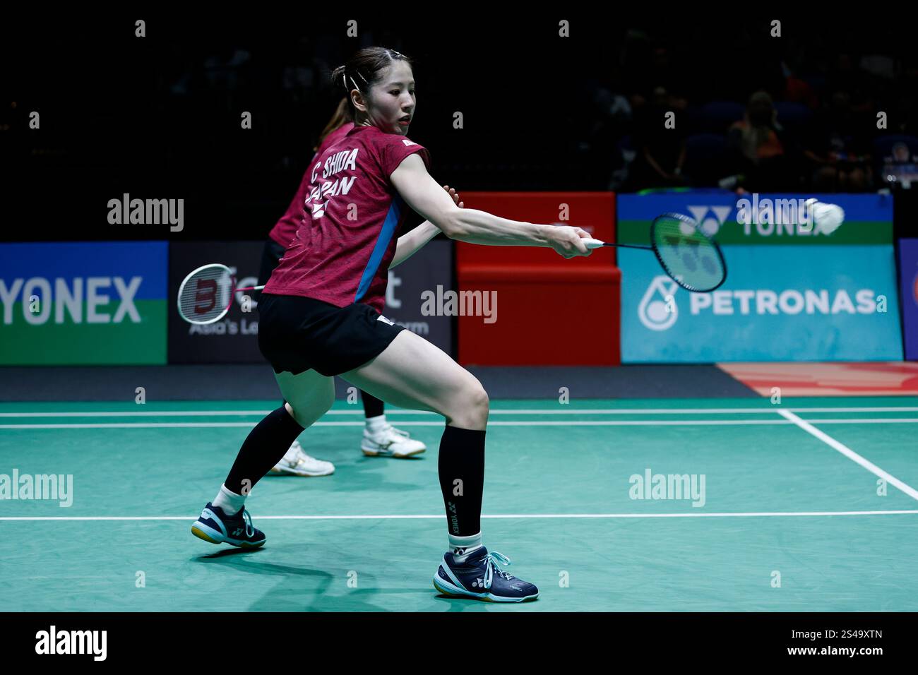 Kuala Lumpur, Malaysia. 10th Jan, 2025. Misaki Matsutomo and Chiharu Shida (L) of Japan play ...