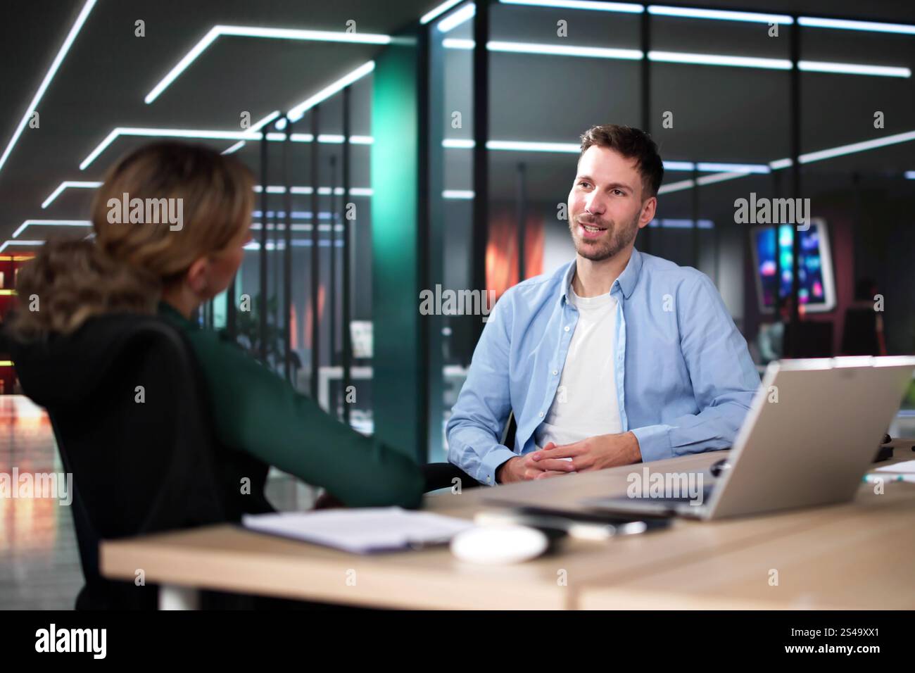 Two People Talking At Meeting In Interview Stock Photo - Alamy
