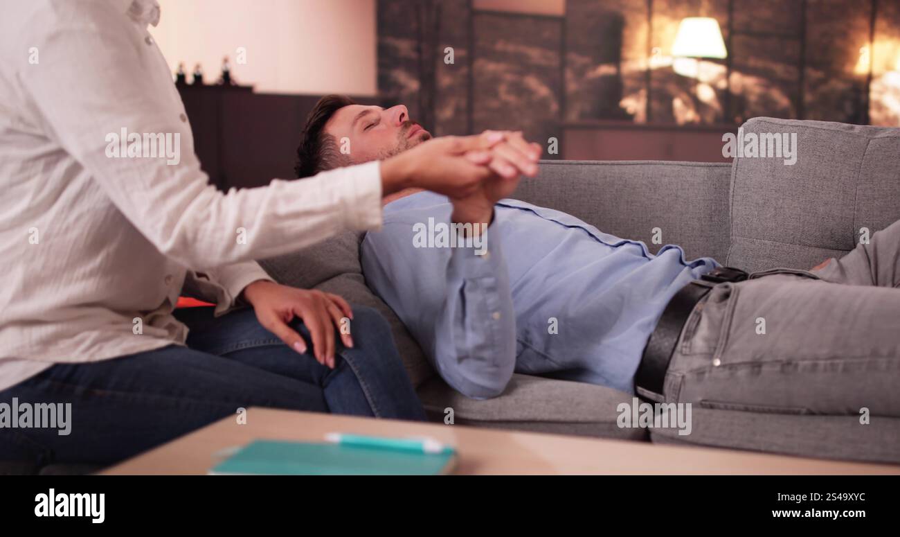 Hypnotherapy Psychotherapy Treatment. Man Hypnotized By Hypnotist Stock ...