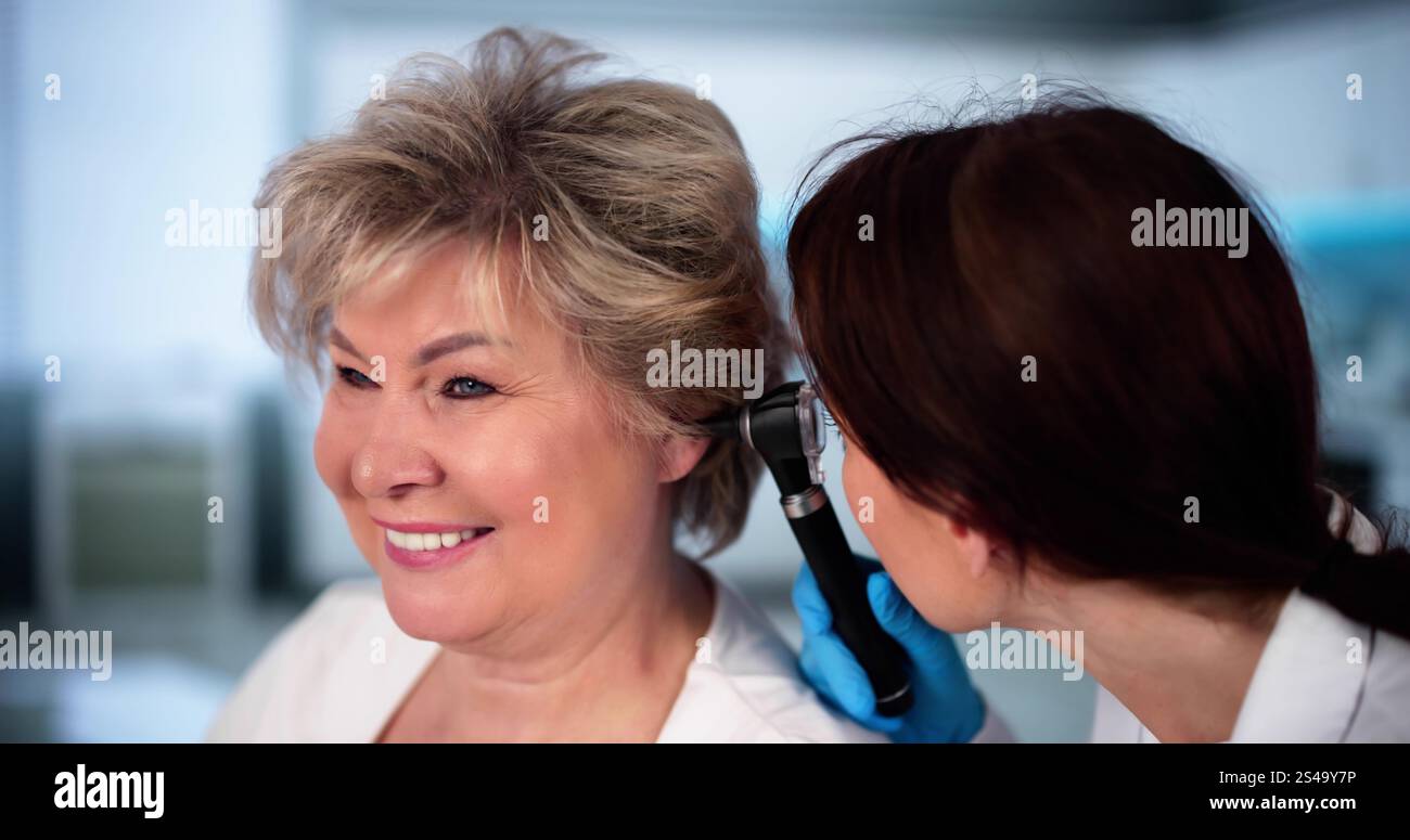 Otolaryngology Ear Check Using Otoscope. Doctor Examining Patient Stock ...
