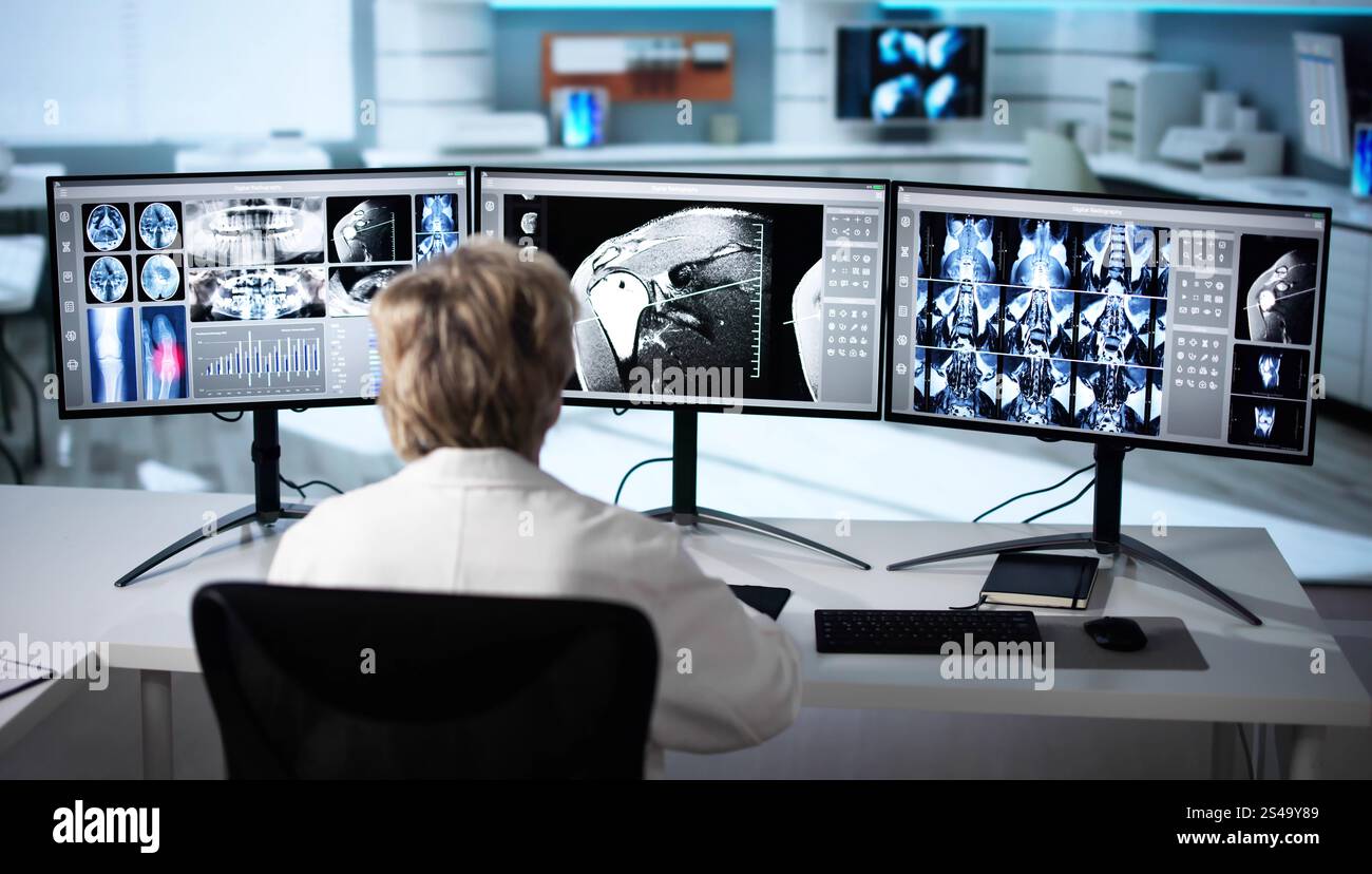 Radiologist Dentist Using X Ray Software On Desktop Computer Stock ...