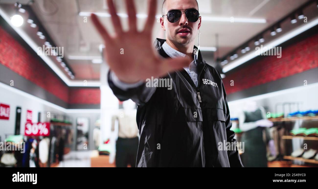 Mall Or Retail Store Security Guard Officer Making Stop Gesture Stock ...