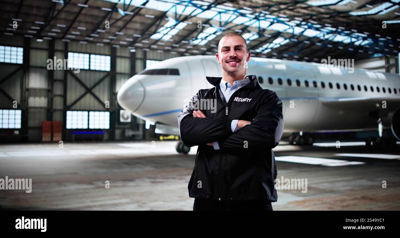 Guard Security Man In Airplane Hangar At Airport Stock Photo - Alamy
