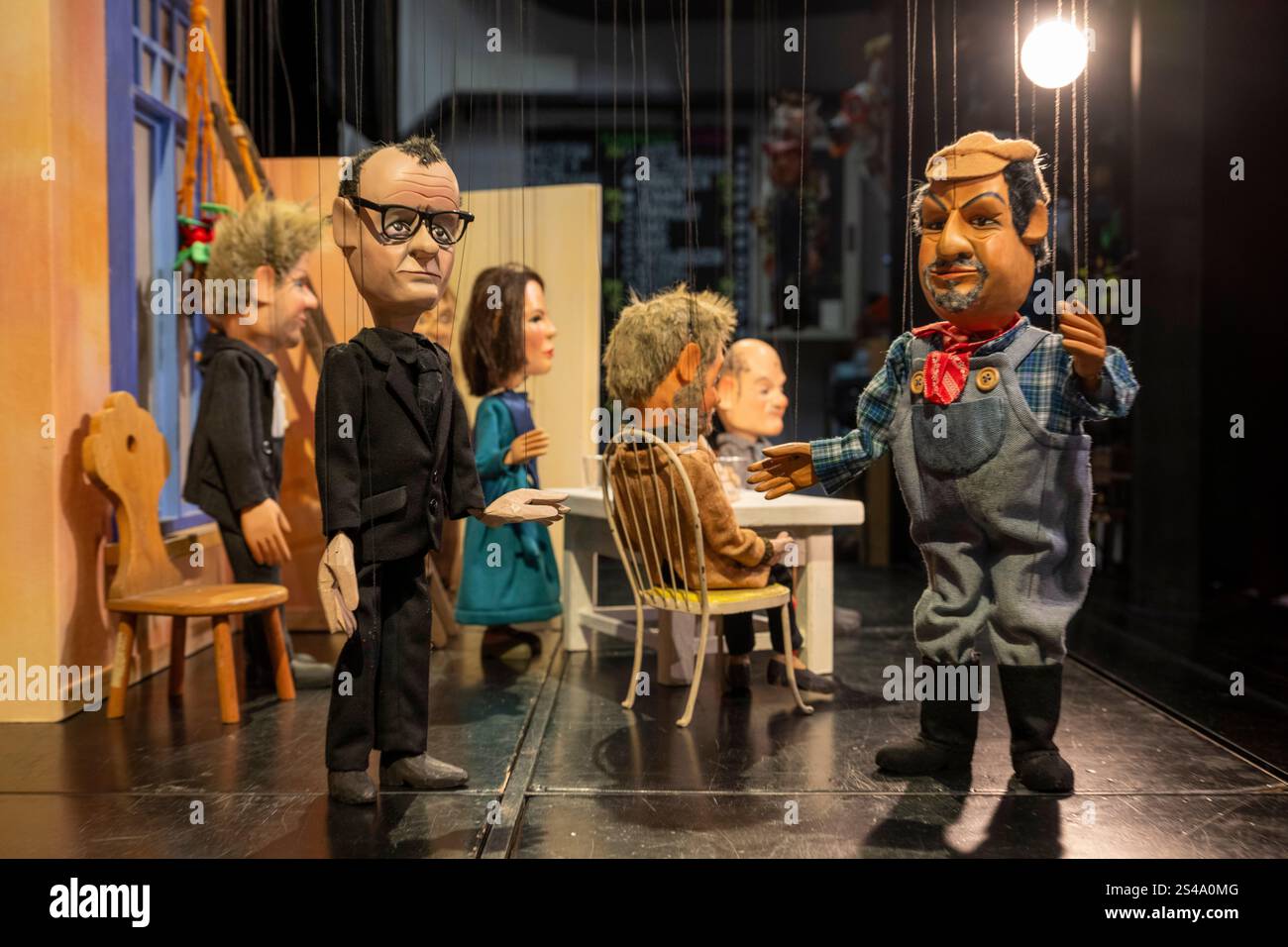 Augsburg, Germany. 10th Jan, 2025. Friedrich Merz (CDU, l) stands as a ...