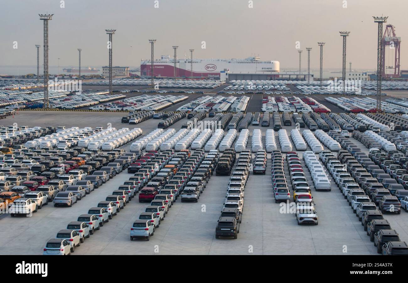 New electric vehicles wait to be loaded on the ro-ro-ship BYD Hefei at ...