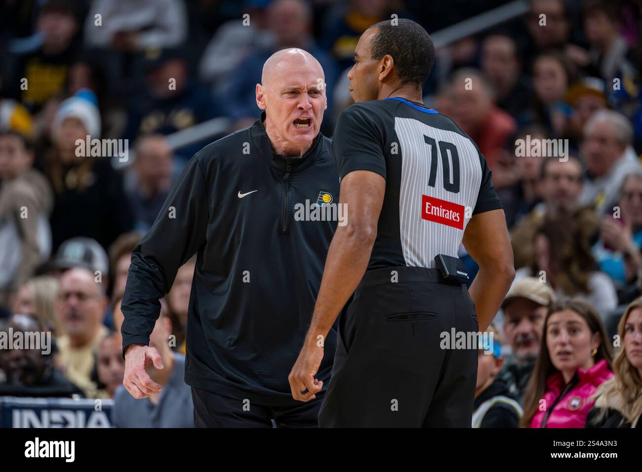Indiana Pacers head coach Rick Carlisle, front left, reacts toward ...
