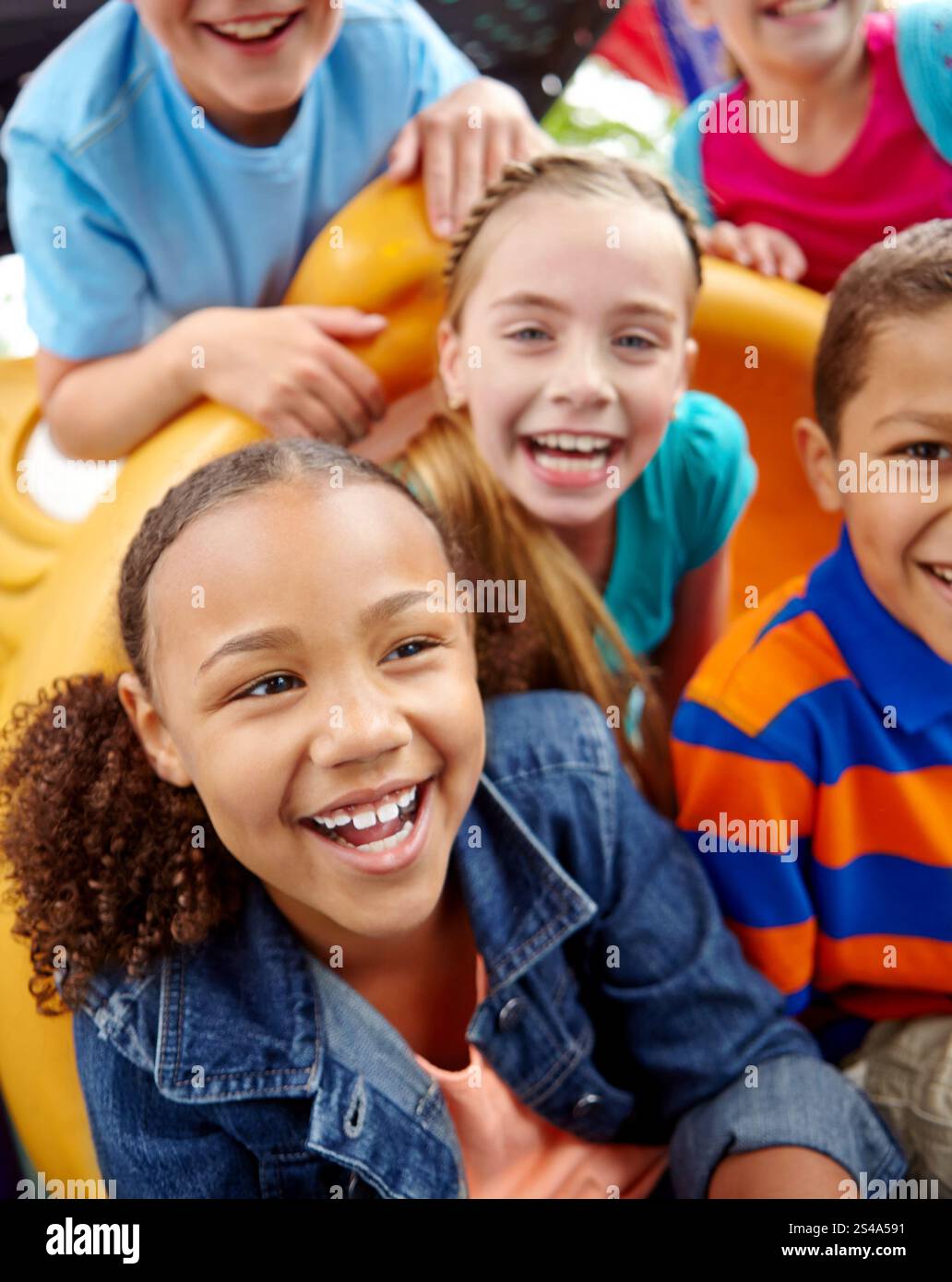 Children, slide and social playground for friends, playing group and ...