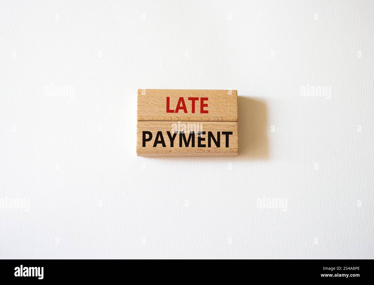 Late payment symbol. Concept word Late payment on wooden blocks ...