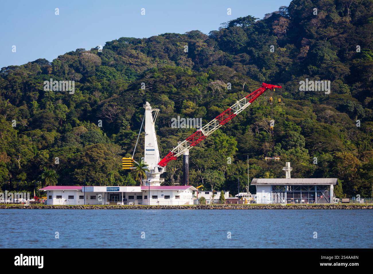 Large crane and buildings beside the Panama Canal at Gamboa, Colon ...