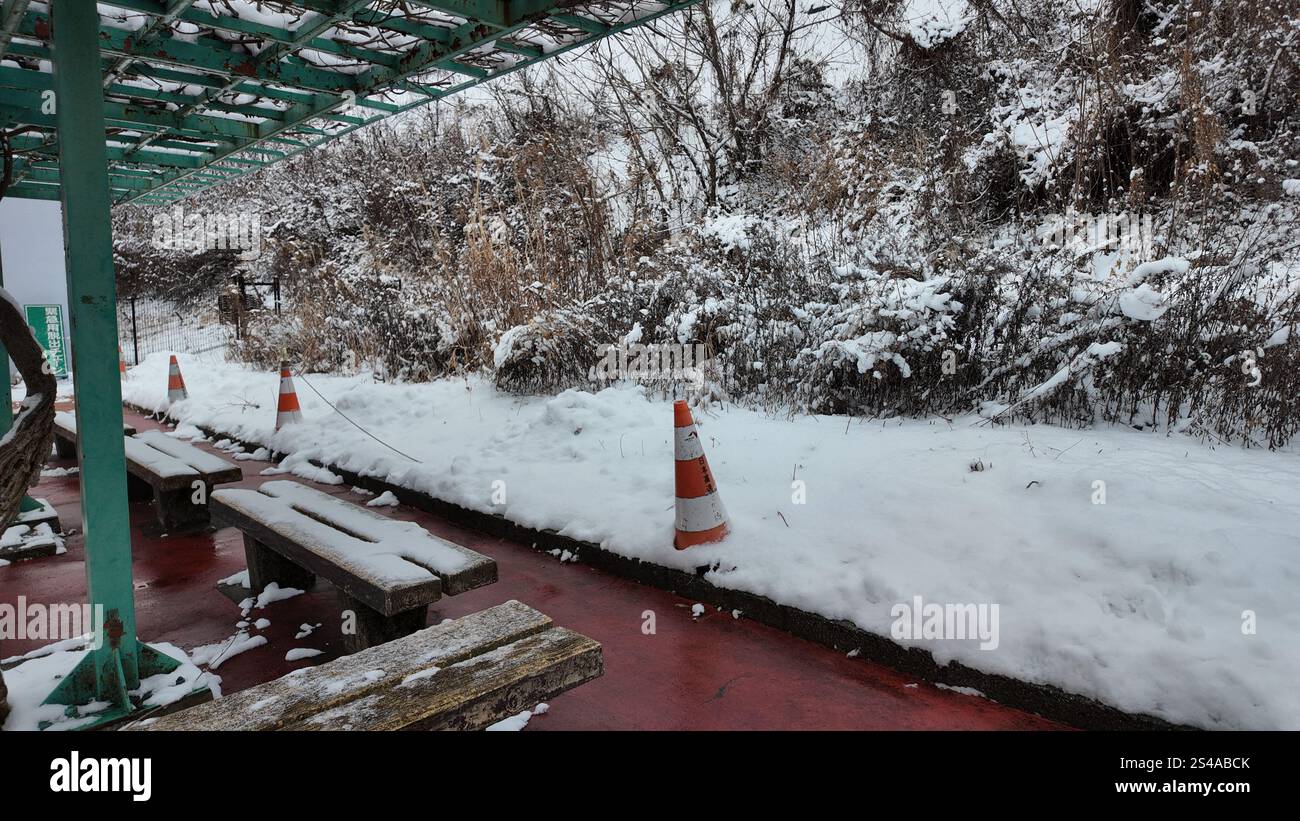 Accumulated snow at Zakoji PA on the Chuo Expressway in Zakoji, Iida ...