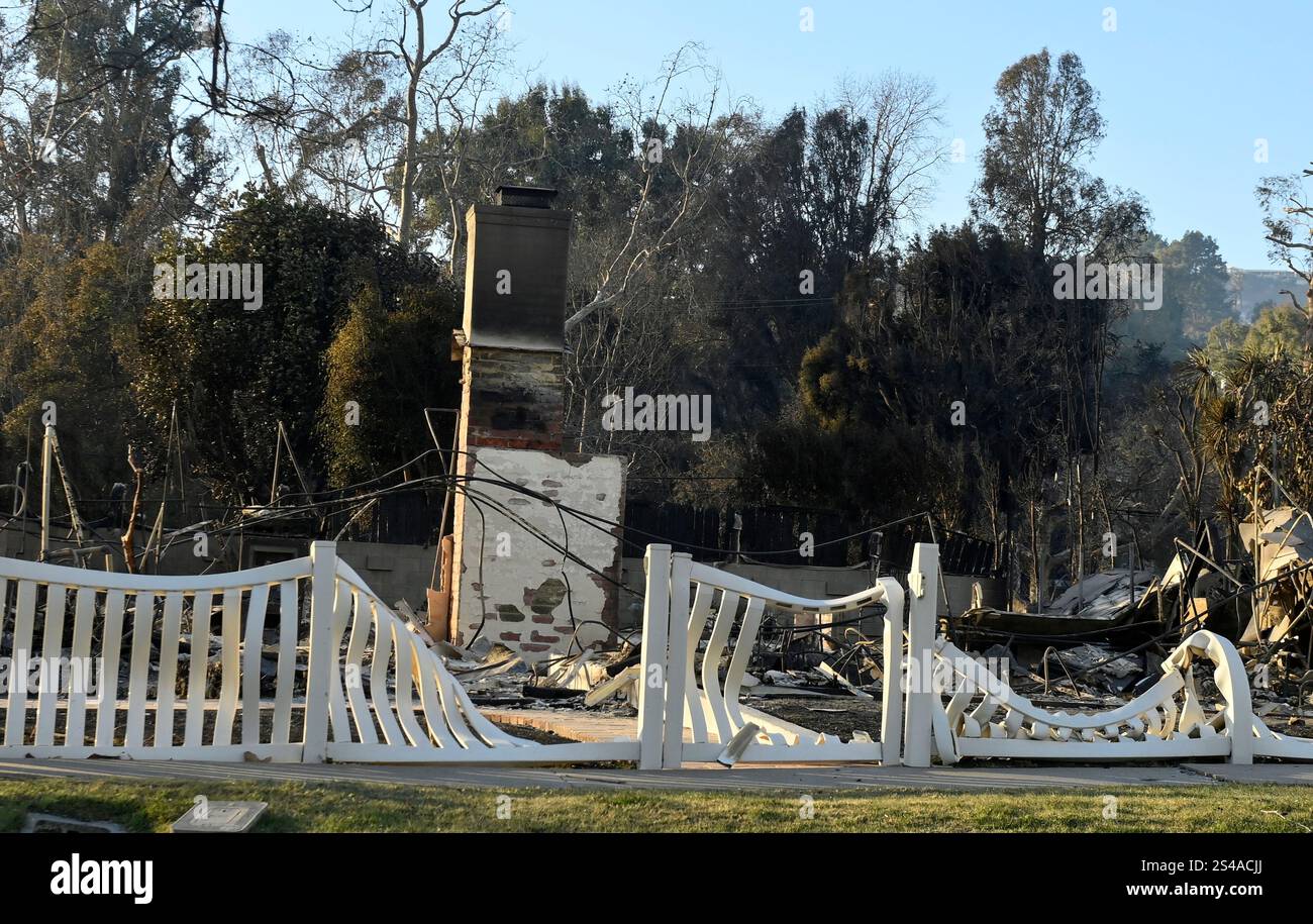 The remains of one of the thousands of structures destroyed by four ...