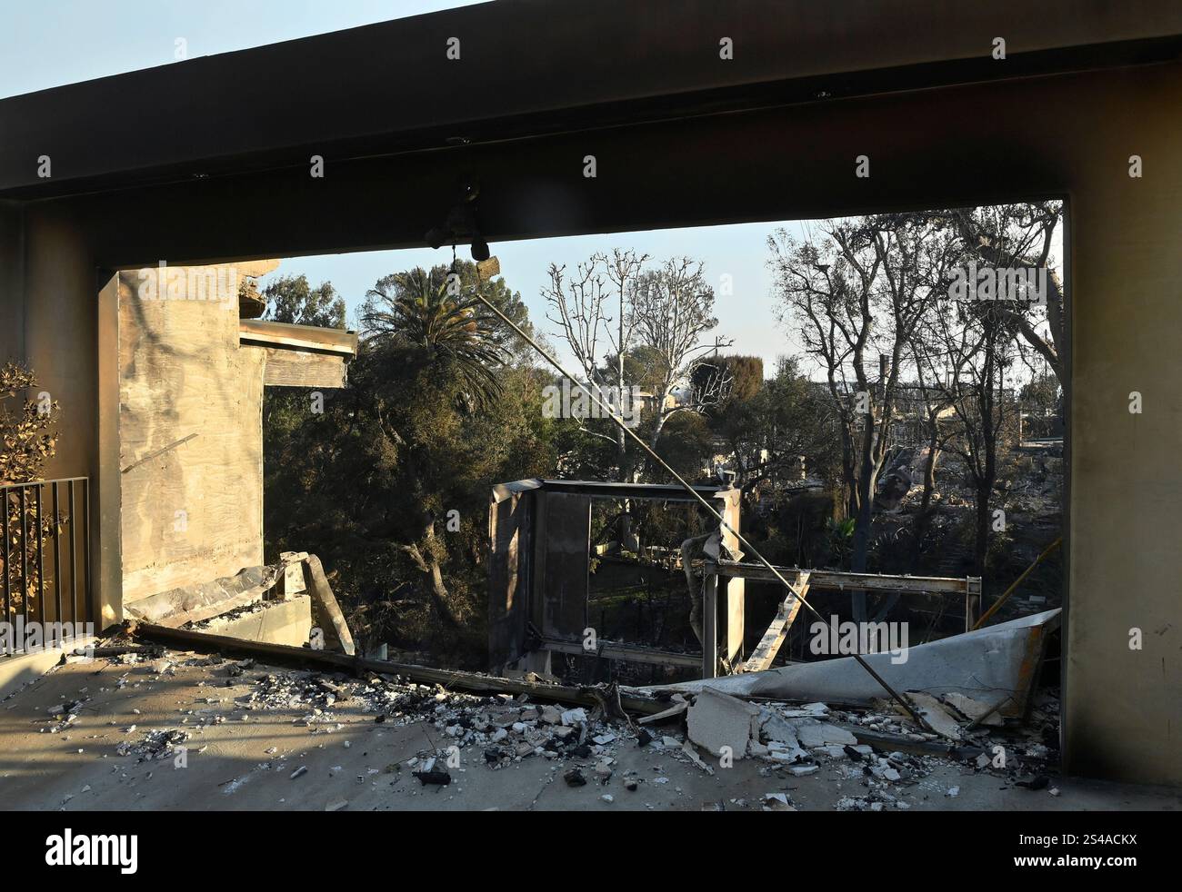 The remains of one of the thousands of structures destroyed by four ...