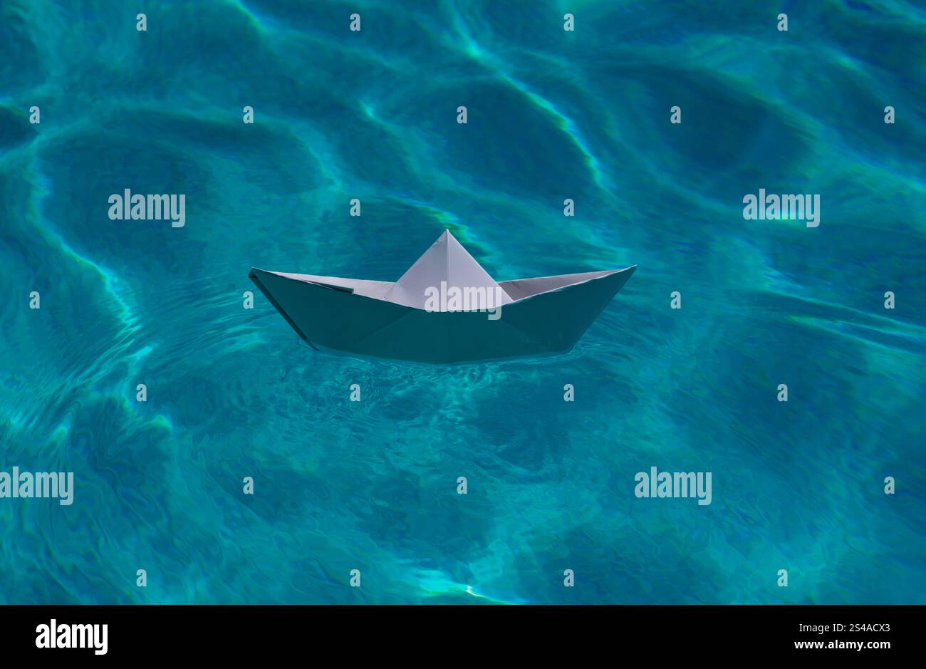 Paper boat on the sea background. Origami paper boat sailing on water ...