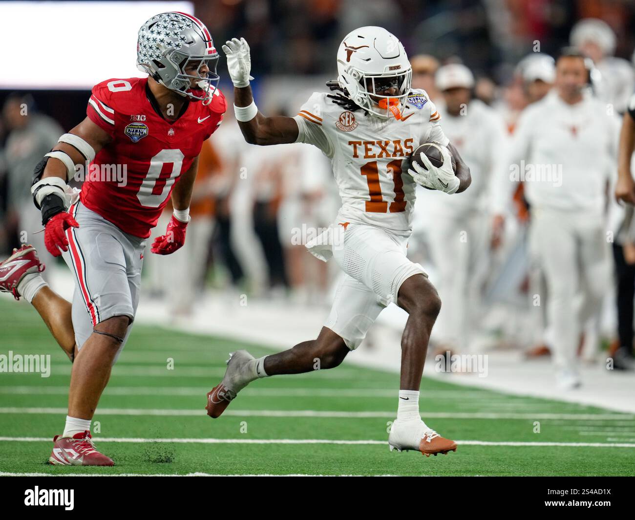 Linebacker Cody Simon (Ohio State Buckeyes, #0) pursues wide receiver Silas Bolden (Texas ...
