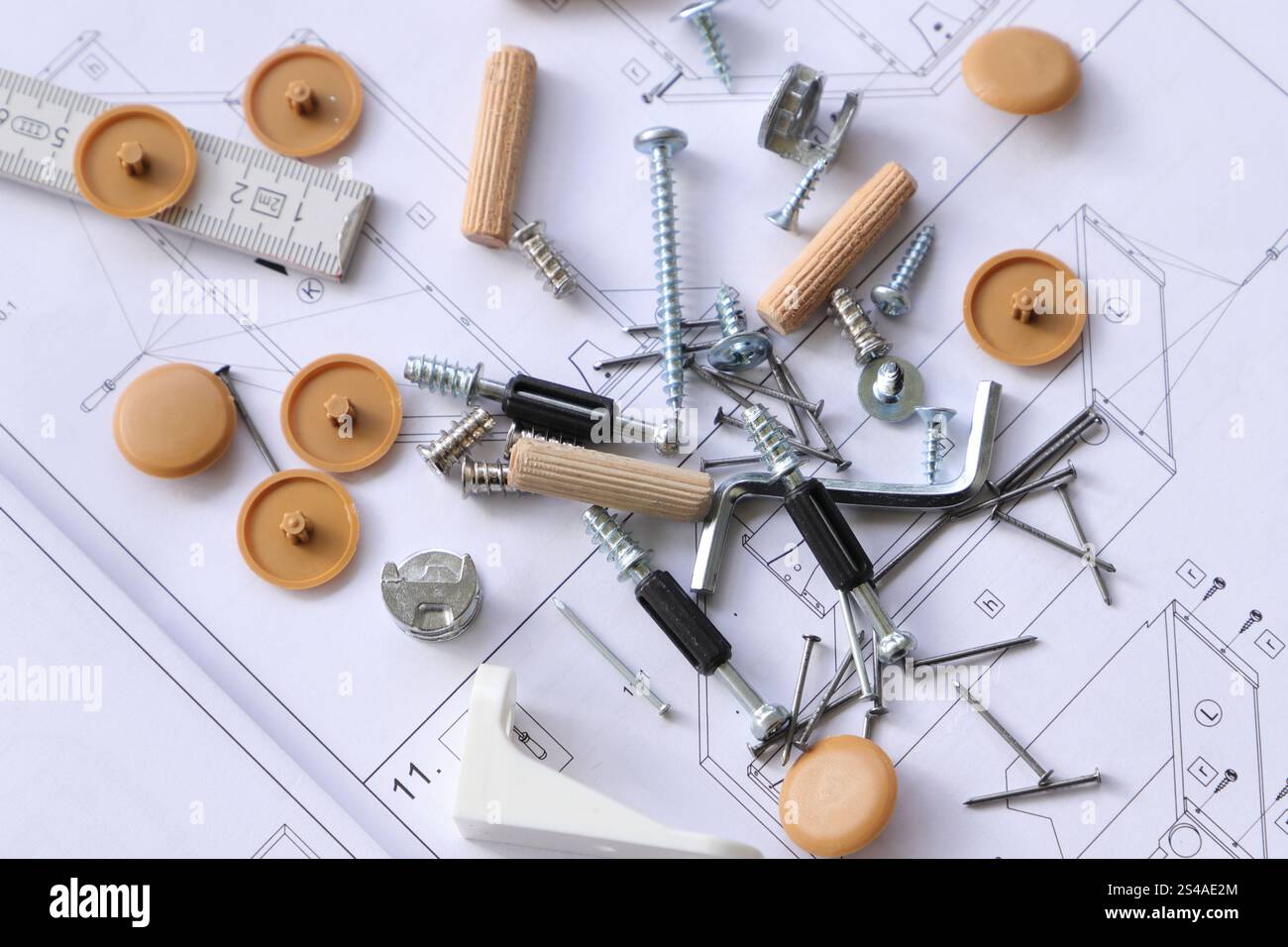an assembly manual for furniture with screws and dowels Stock Photo - Alamy