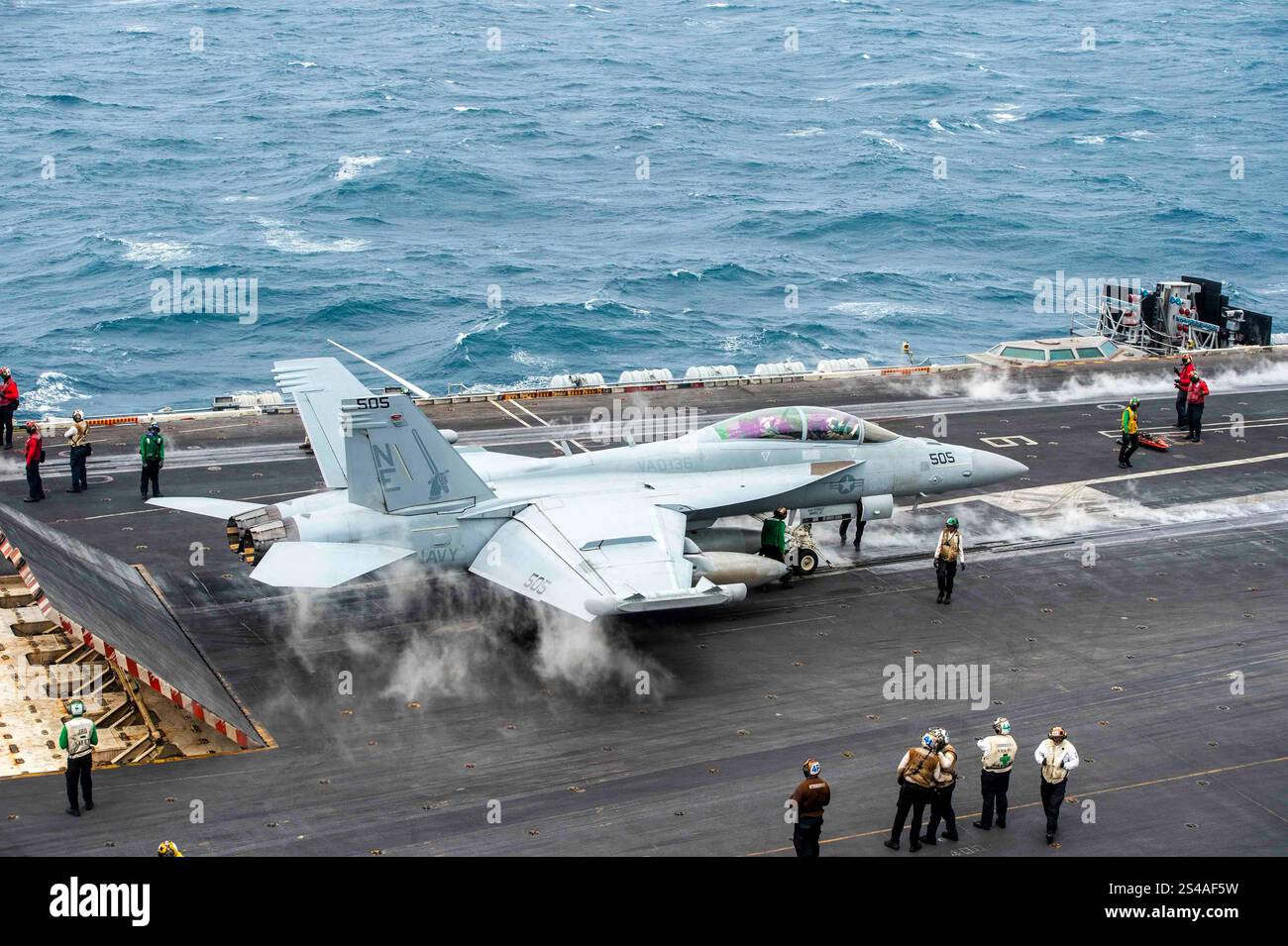250110-N-FS097-1122 SOUTH CHINA SEA (Jan. 10, 2025) An EA-18G Growler ...