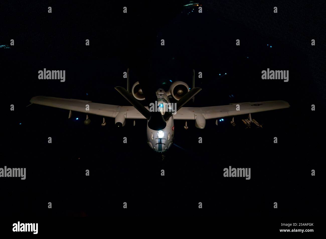 A U.S. Air Force KC-135 Stratotanker offloads fuel to an A-10 ...