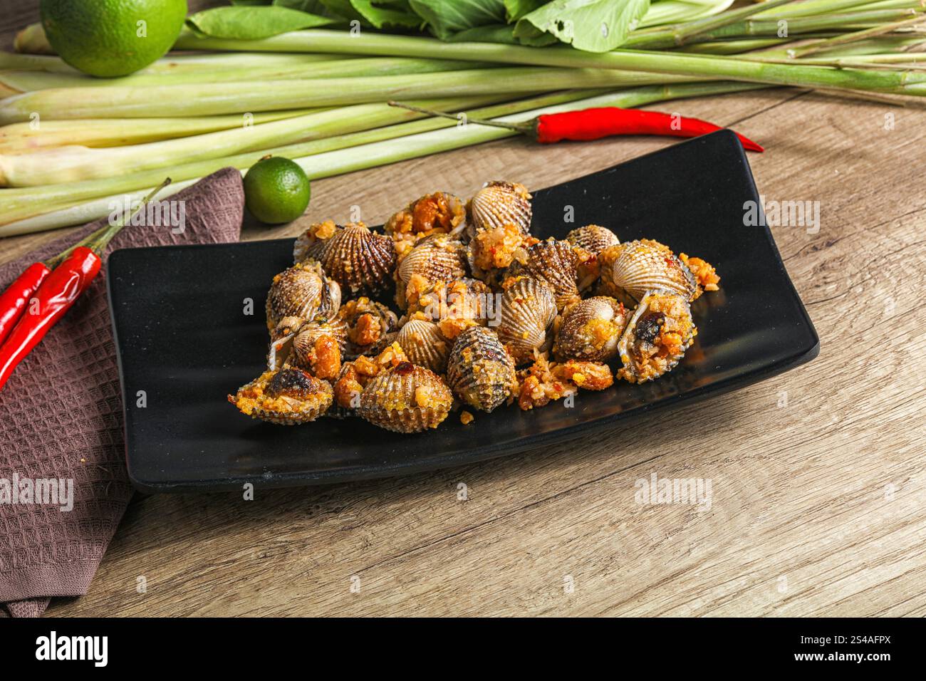 Blood Cockle Fried With Garlic and spices Stock Photo - Alamy