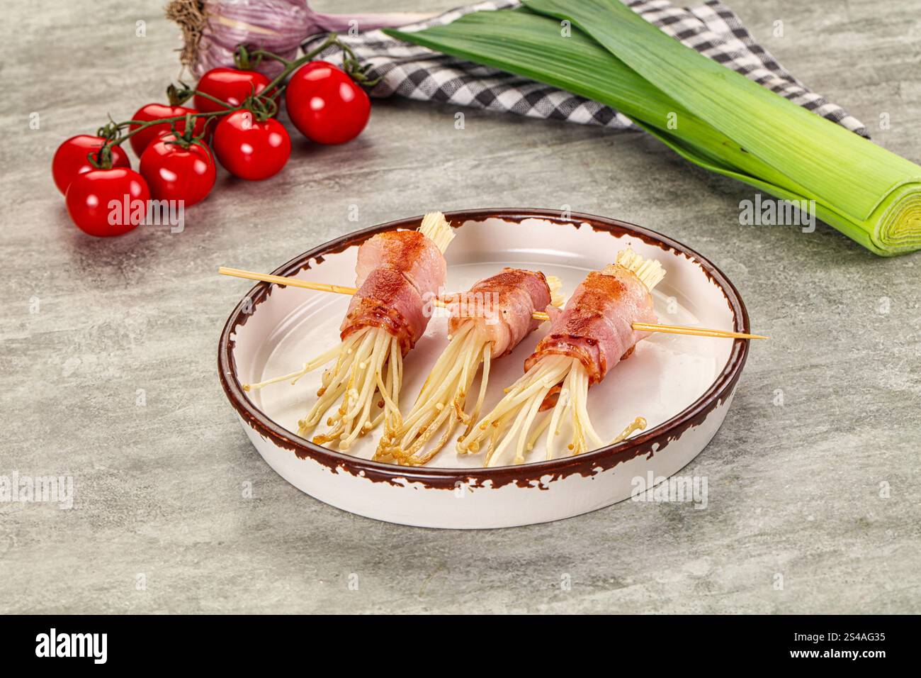 Grilled enoki mushroom with bacon roll wrap Stock Photo - Alamy