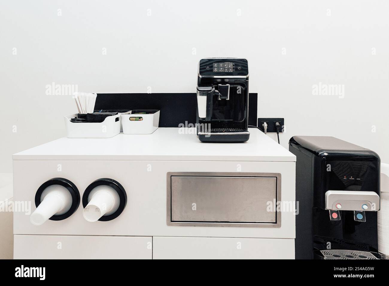 Coffee machine making hot drink in office table for breaks from work ...