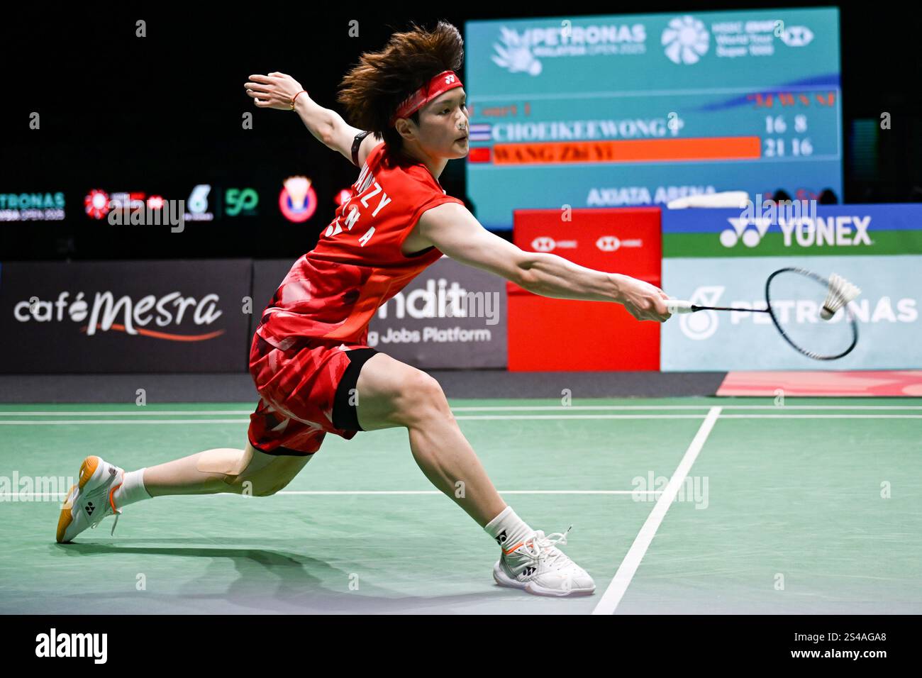 Kuala Lumpur, Malaysia. 11th Jan, 2025. Wang Zhiyi hits a return during ...