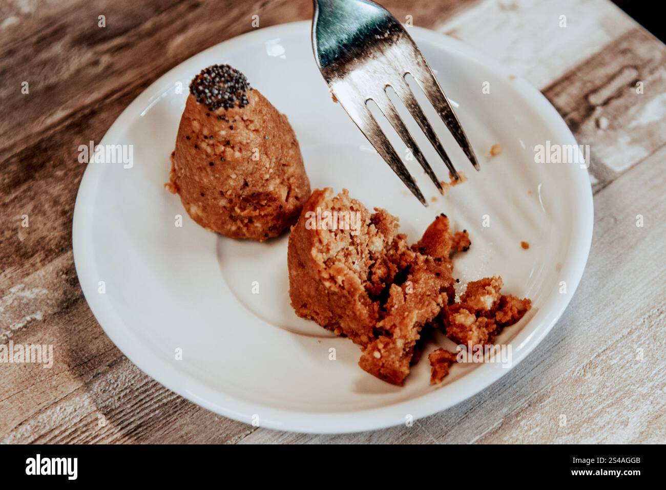 Sweet pastry dessert on glass plate, pastry cake in confectionery shop ...