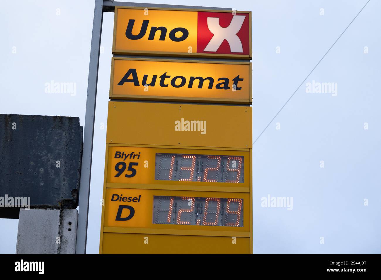 In this photo, a billboard of the Uno-X gas station shows the prices of ...