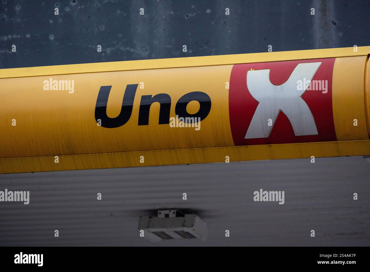 Denmark. 09th Dec, 2024. Uno-X logo is seen displayed outside one of ...
