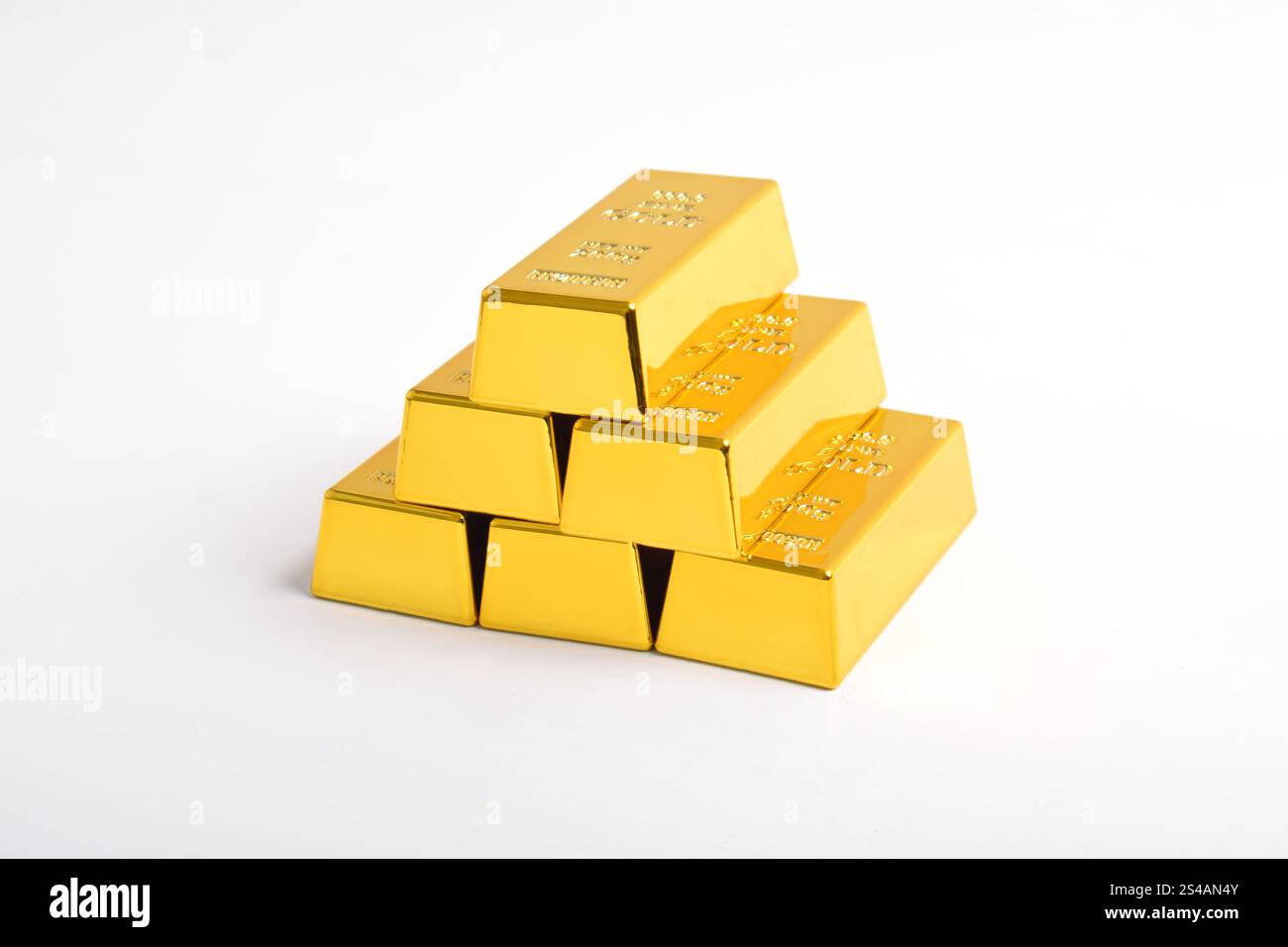 Stack of shiny gold bars isolated on white background Stock Photo - Alamy