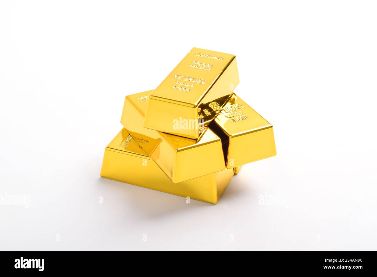 Stack of shiny gold bars isolated on white background Stock Photo - Alamy