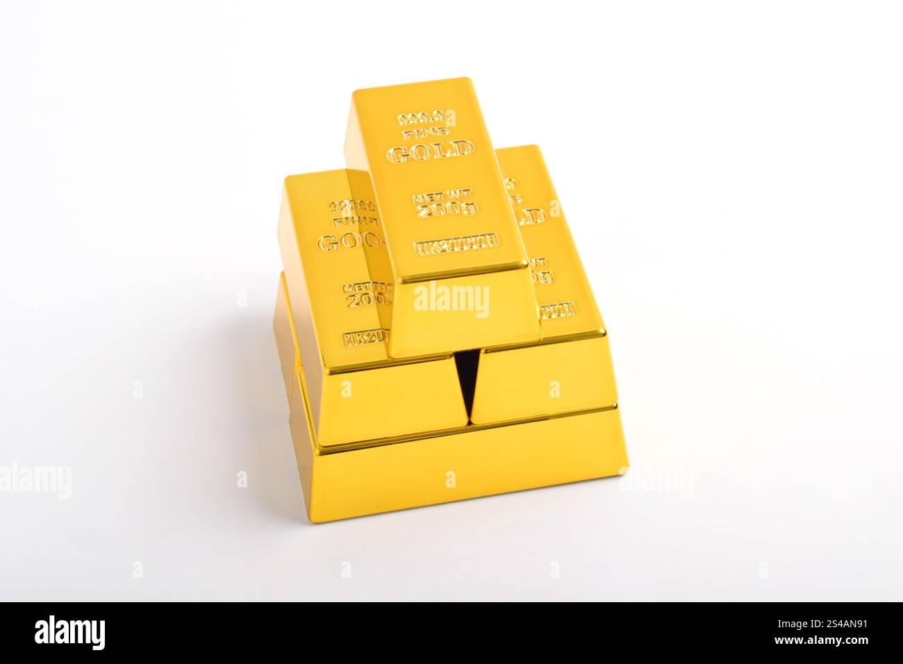 Stack of shiny gold bars isolated on white background Stock Photo - Alamy